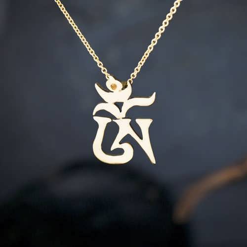 Tibetan OM penadnt small - Gold